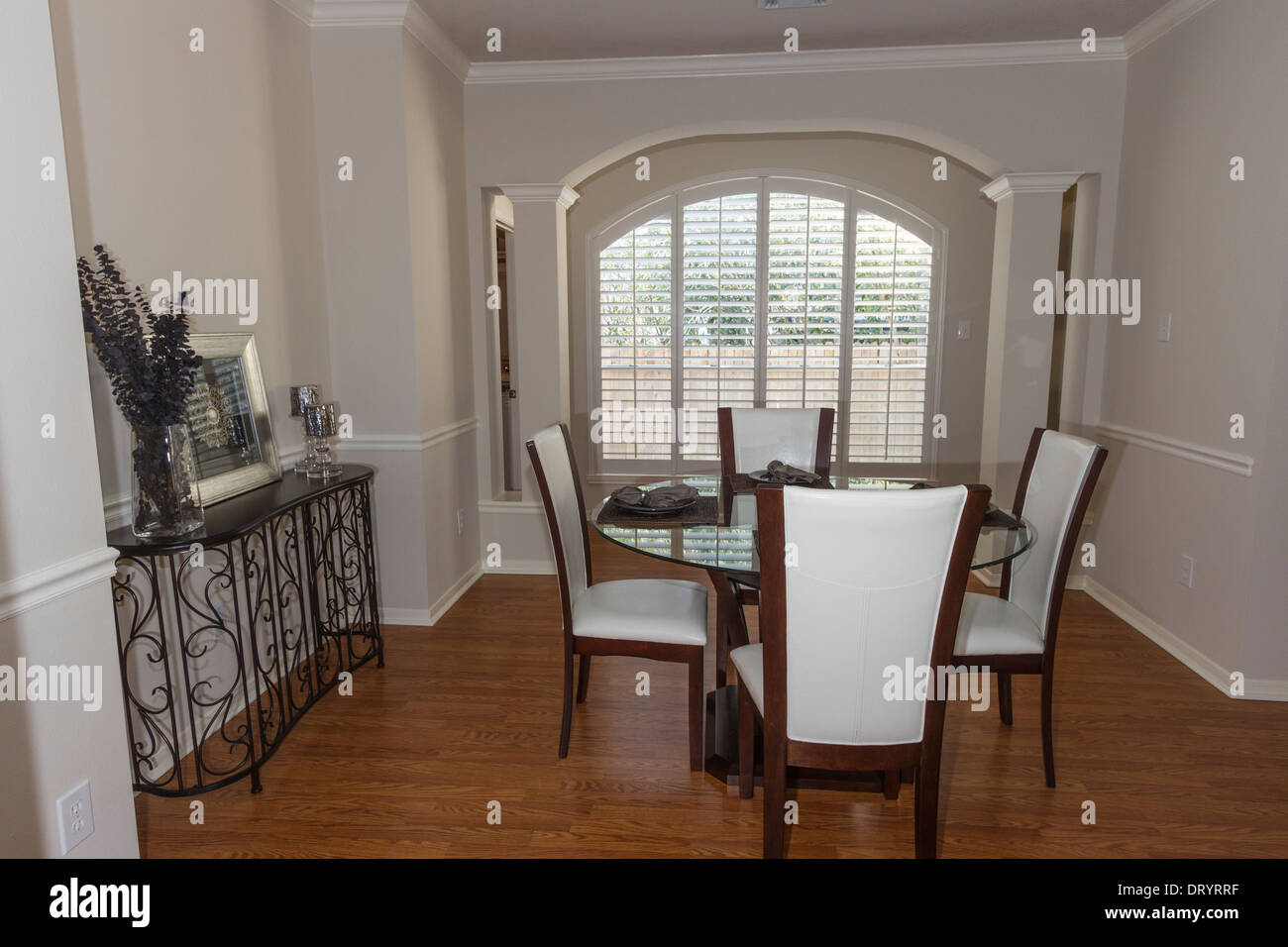dining room and picture window in mid-sized home in suburban ...