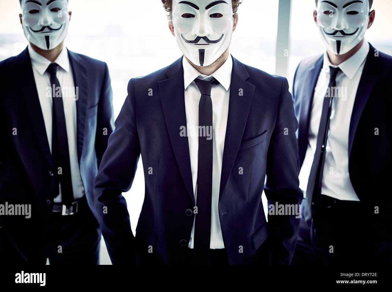 Portrait of three masked guys with attitude Stock Photo - Alamy