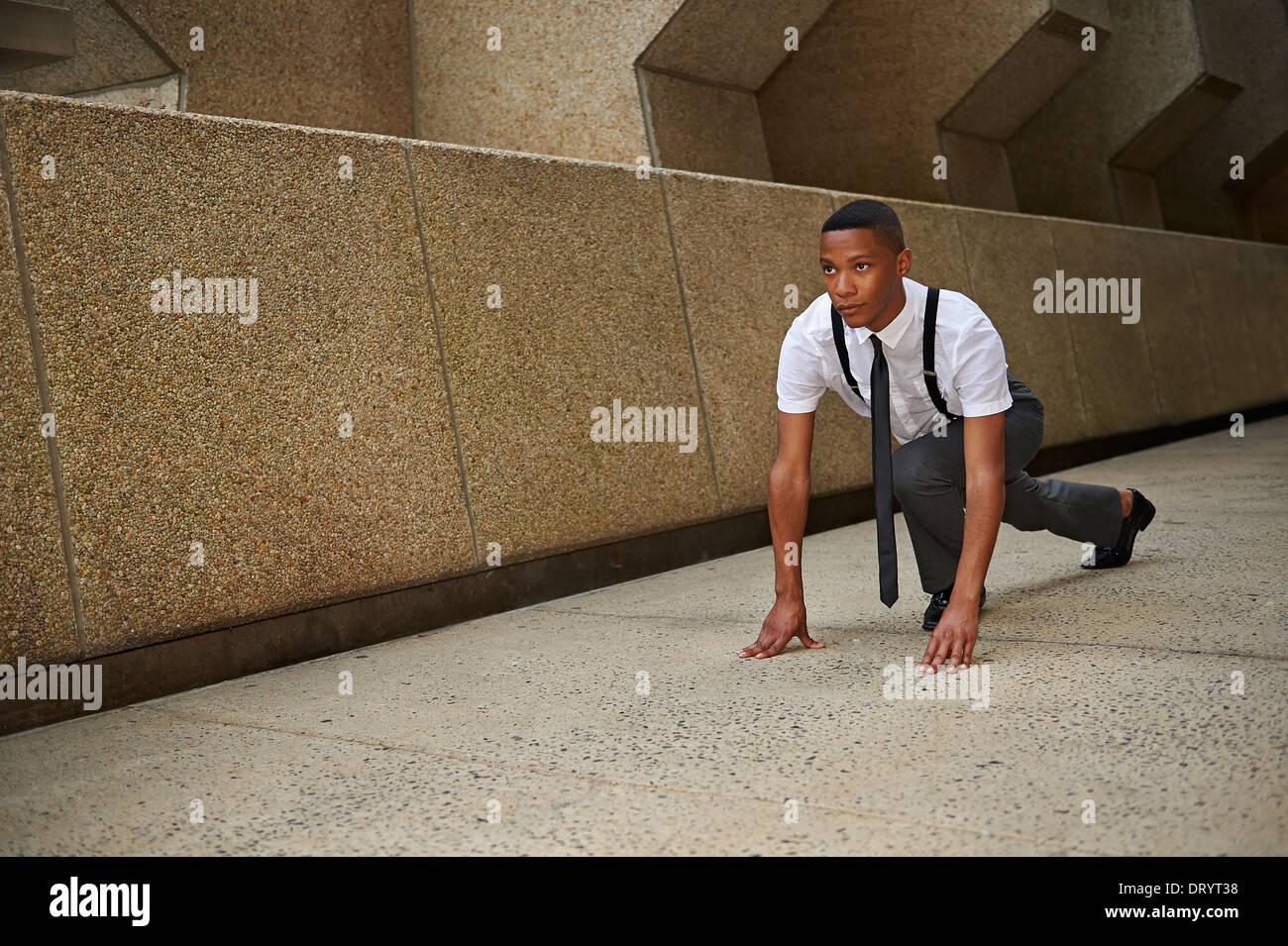 Young successful business man starting a race Stock Photo - Alamy