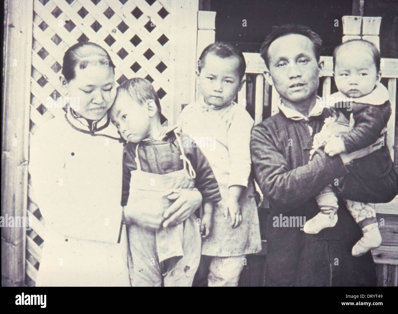 A photograph showing a gatekeeper and his family in Changde, Hunan ...