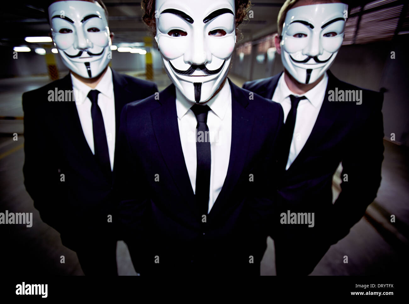 Young man wearing anonymous mask hi-res stock photography and images ...