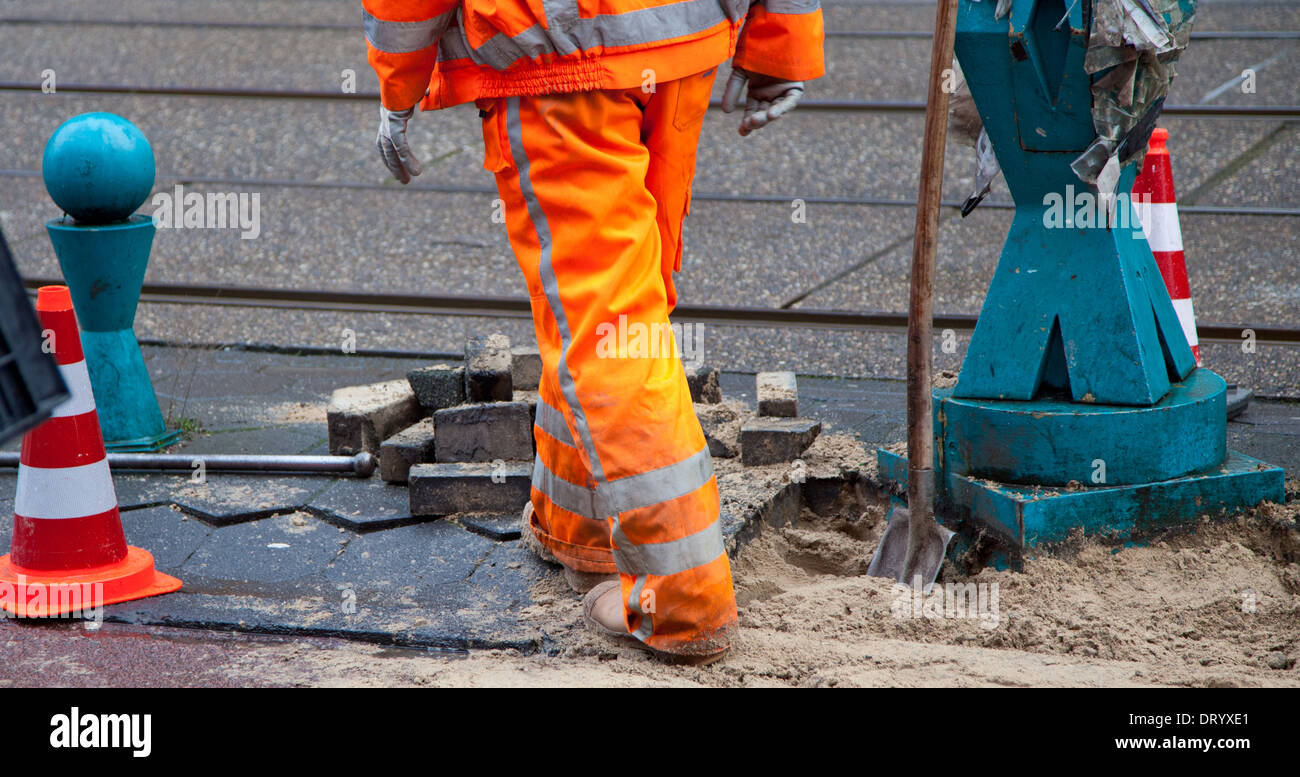 Construction worker during road works Stock Photo - Alamy
