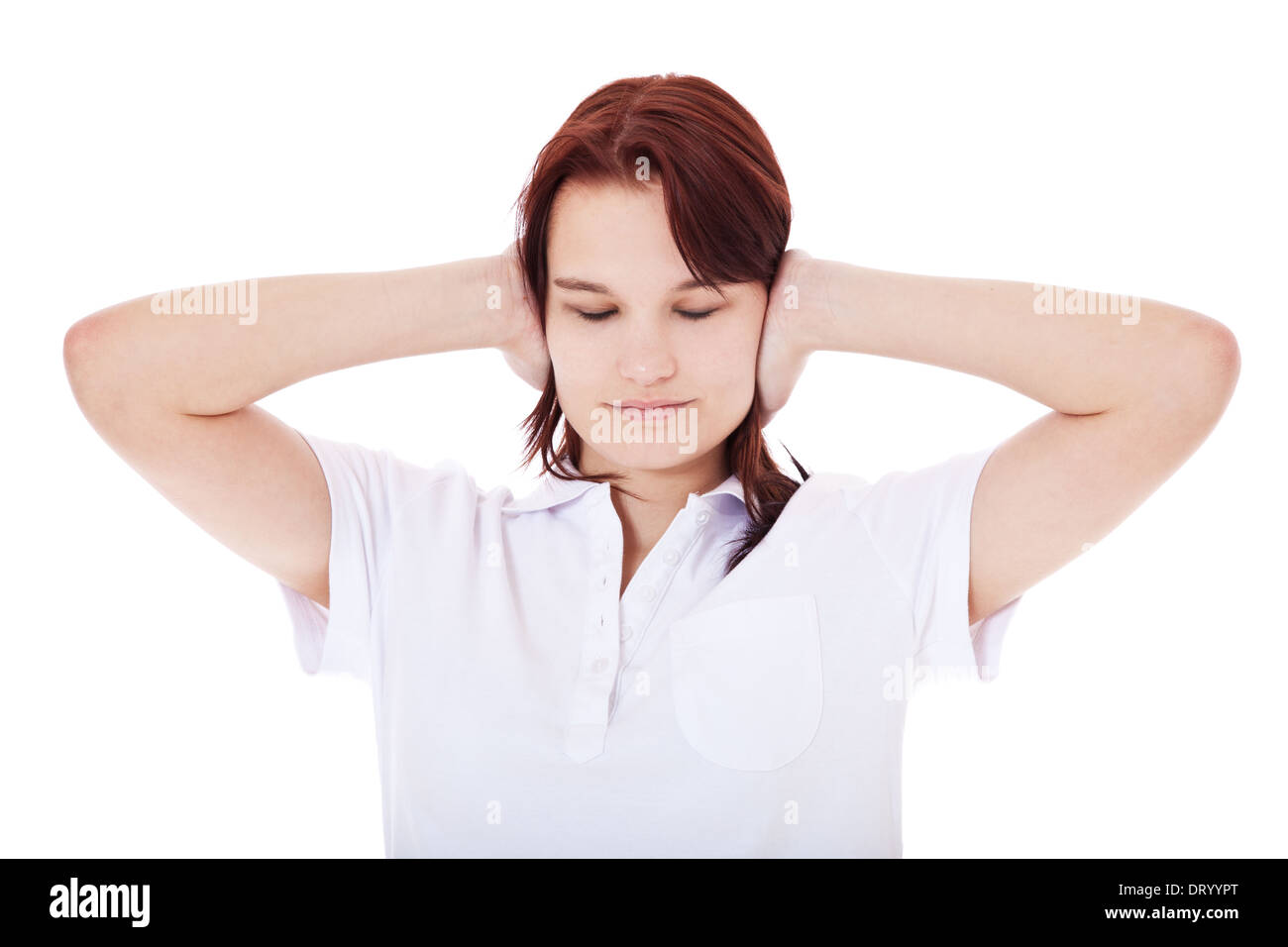 Attractive girl keeps her ears shut. All on white background Stock ...