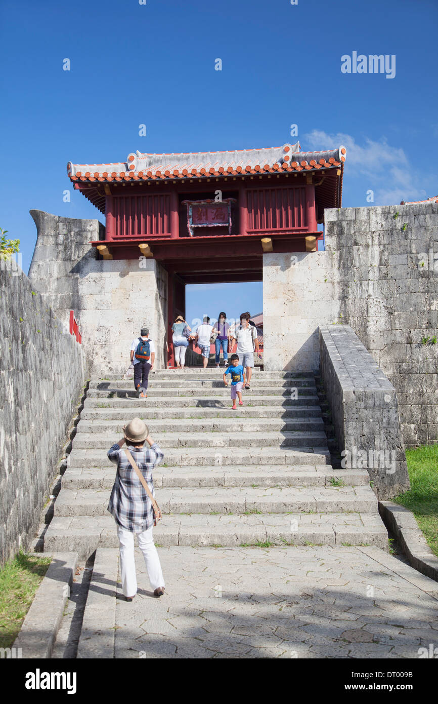 People passing through gate at Shuri Castle, (UNESCO World Heritage ...