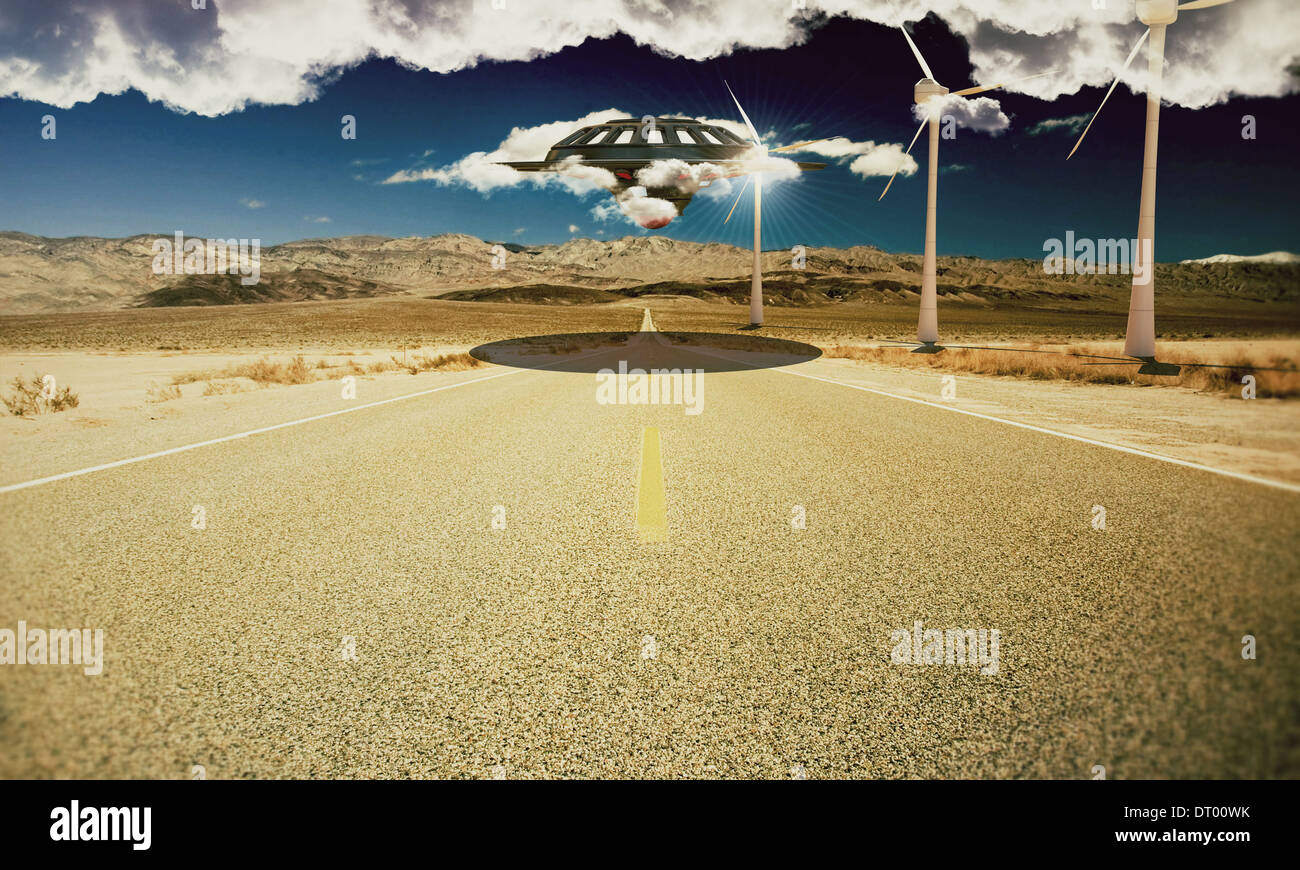 unidentified object flying over a desert road Stock Photo - Alamy