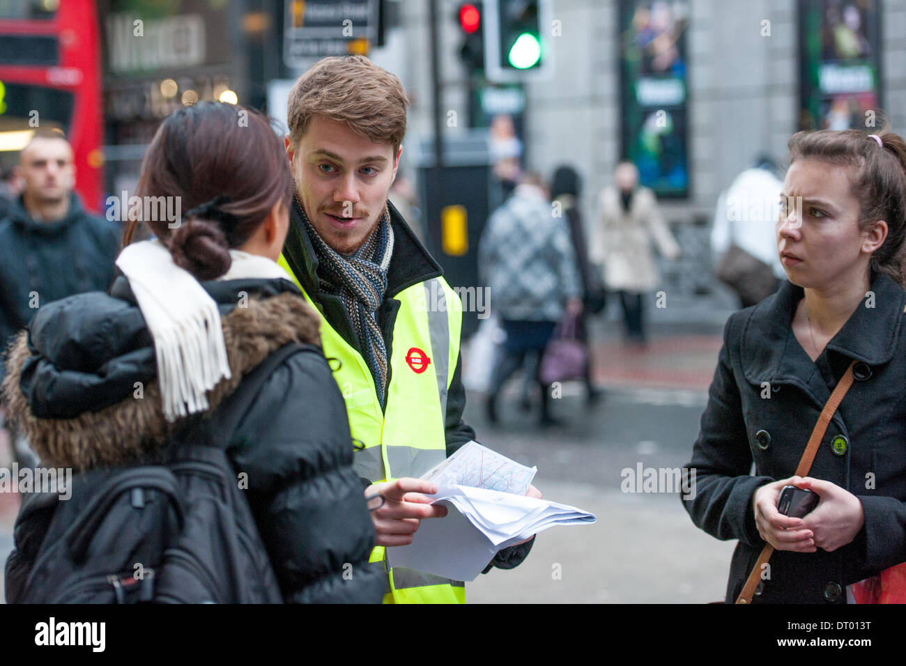 London, UK. Transport for London staff providing travel advice for ...
