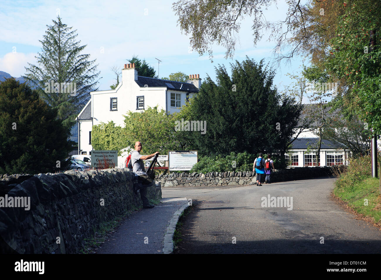 Walkers outside the Rowardennan Hotel on the eastern banks of Loch ...
