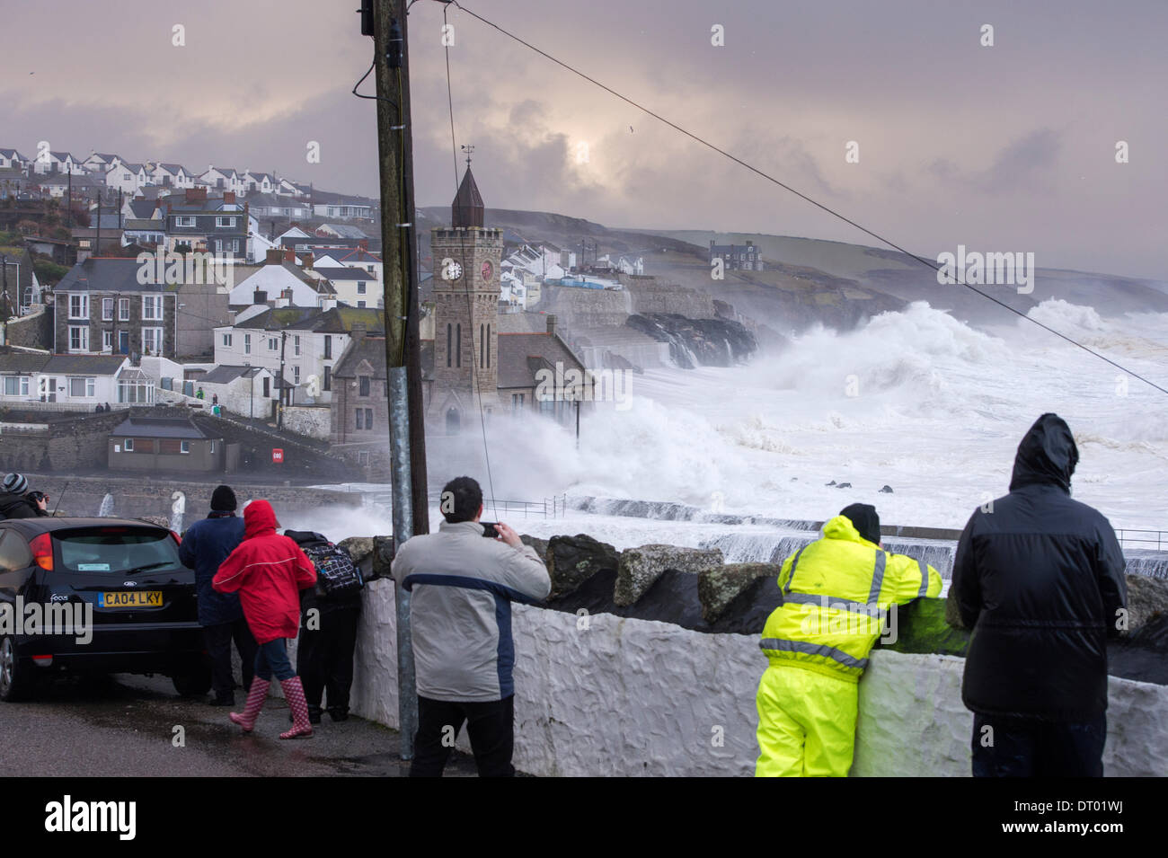 Porthleven, Cornwall, UK . 05th Feb, 2014. Storm Watchers look on at ...