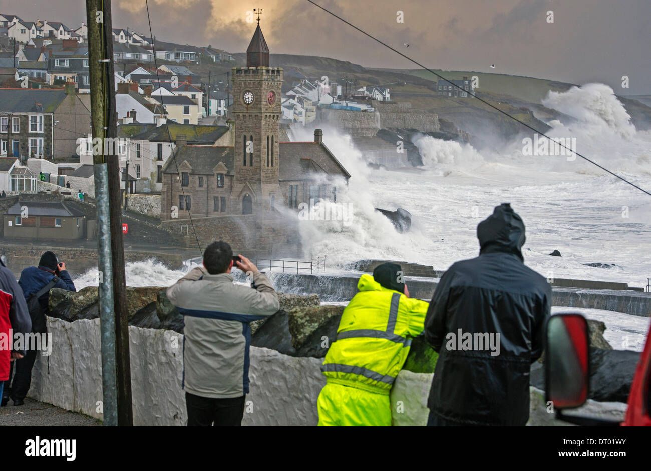 Porthleven, Cornwall, UK . 05th Feb, 2014. Storm Watchers look on at ...