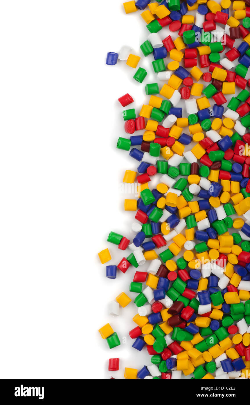 Colorful plastic polymer granules on white background Stock Photo - Alamy