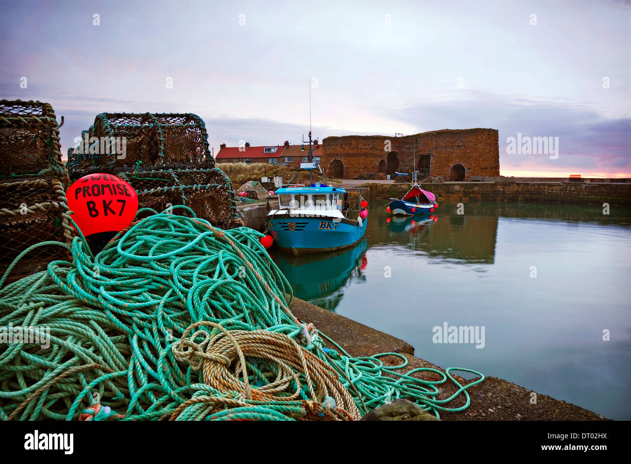 Fishing boats in Beadnell Harbour, Northumberland Stock Photo - Alamy