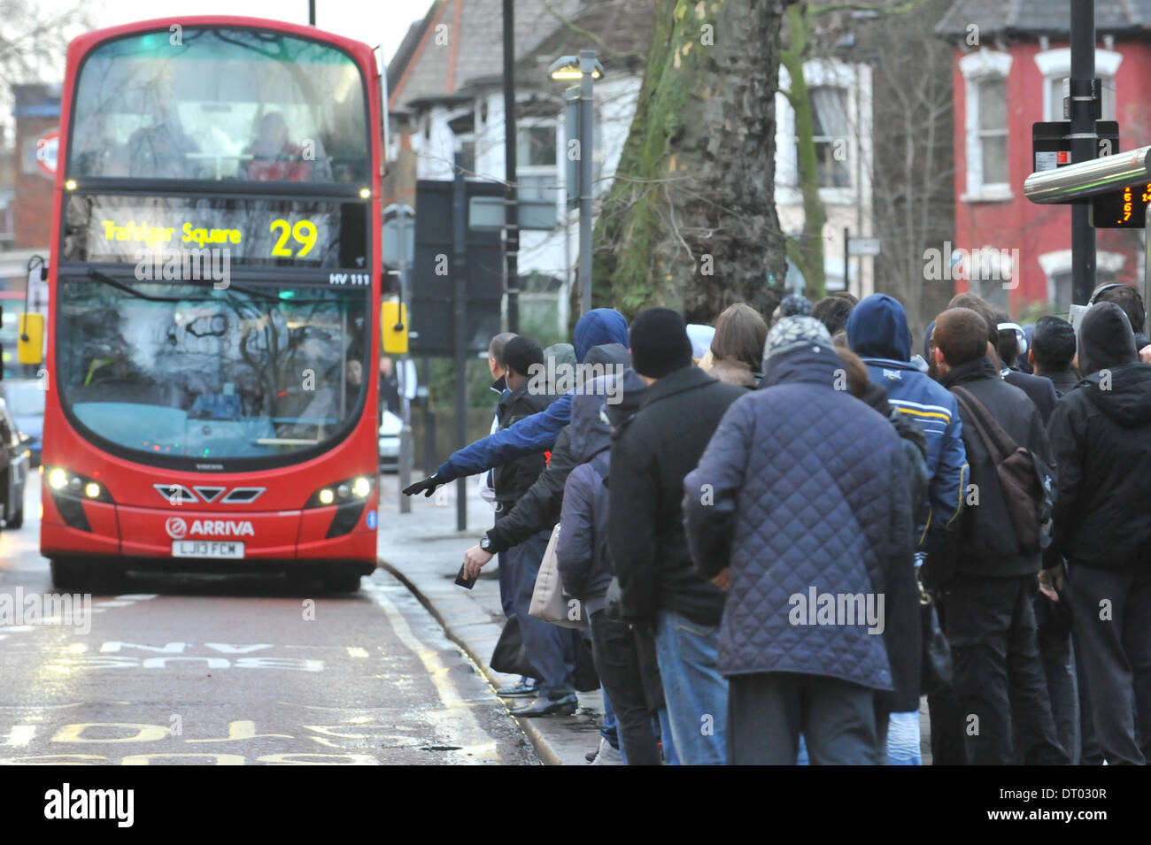 London buses queues hi-res stock photography and images - Alamy