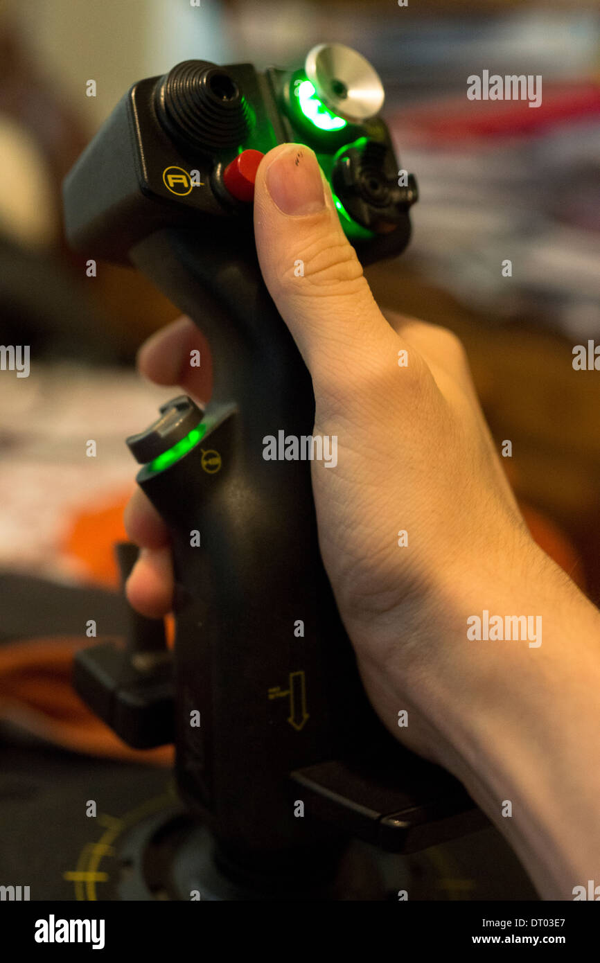 saitek X65F joystick Hand thumb flight stick Stock Photo - Alamy