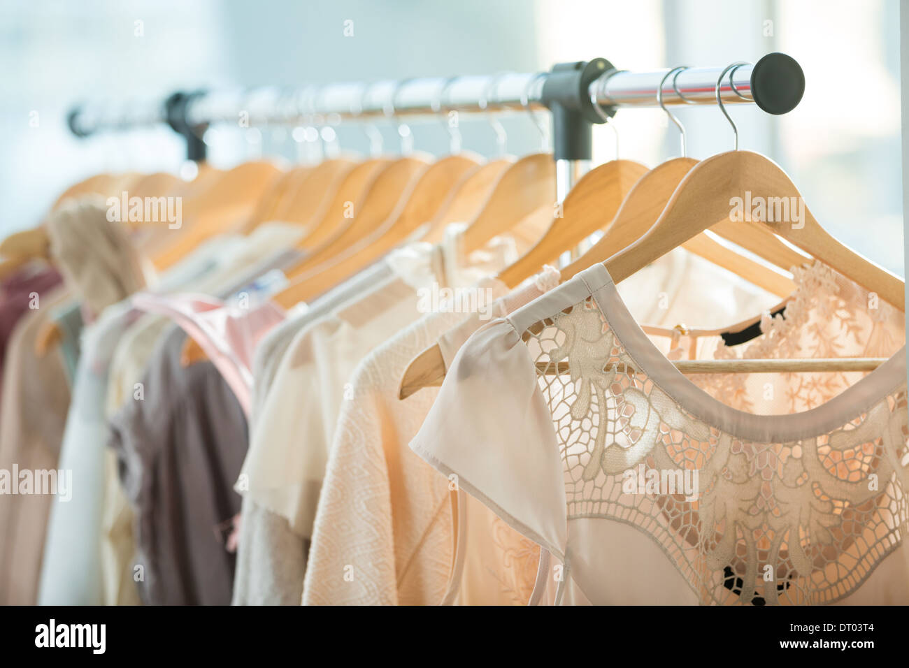 Dresses on hangers hi-res stock photography and images - Alamy