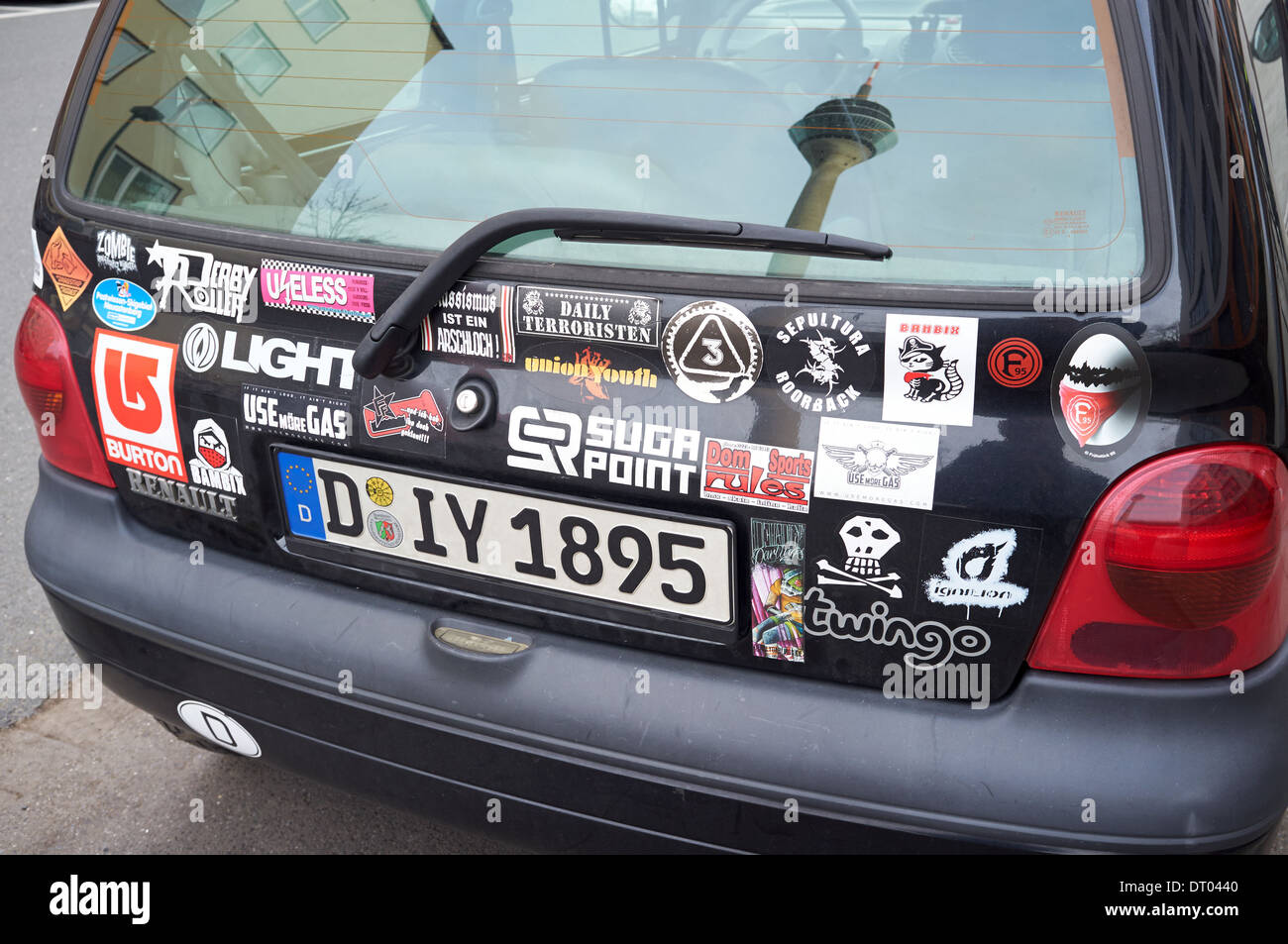 Rear of car with stickers Stock Photo - Alamy