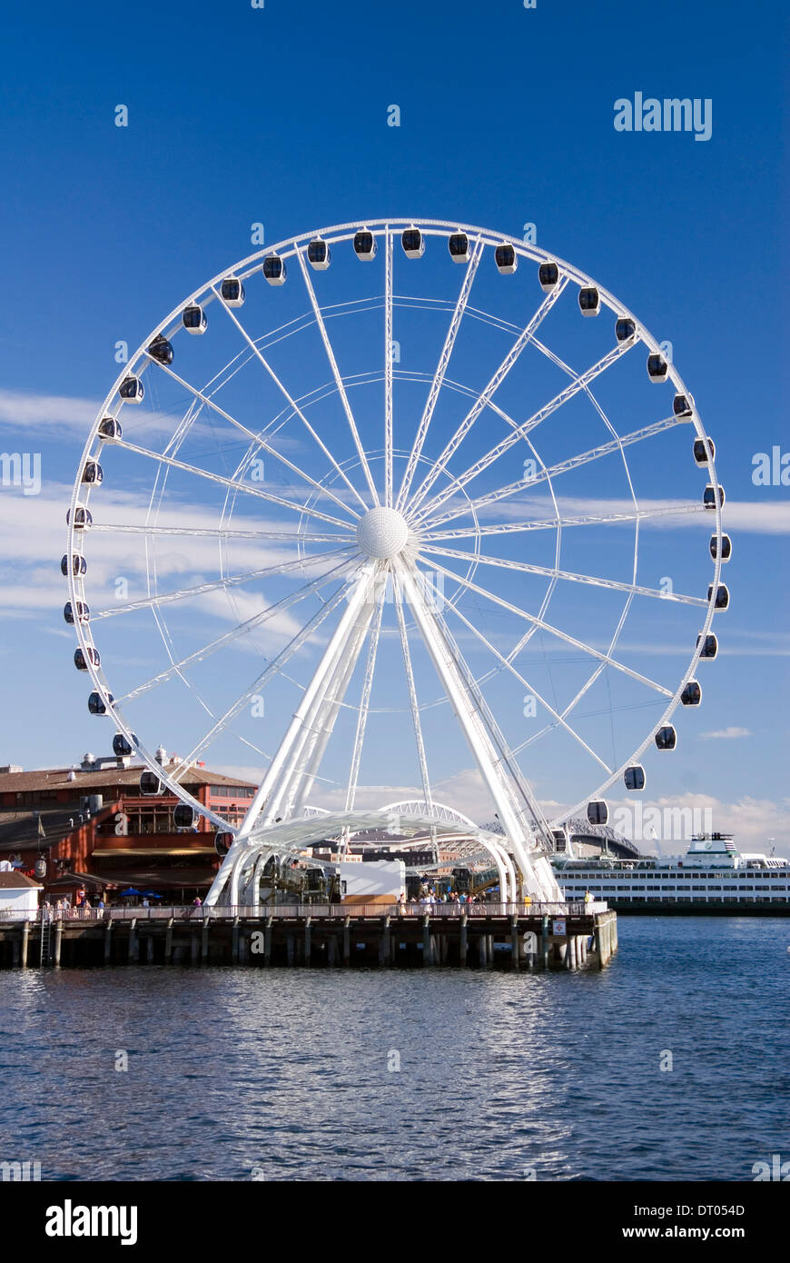 The Seattle Great Wheel ferris wheel at the end of a boardwalk at the ...