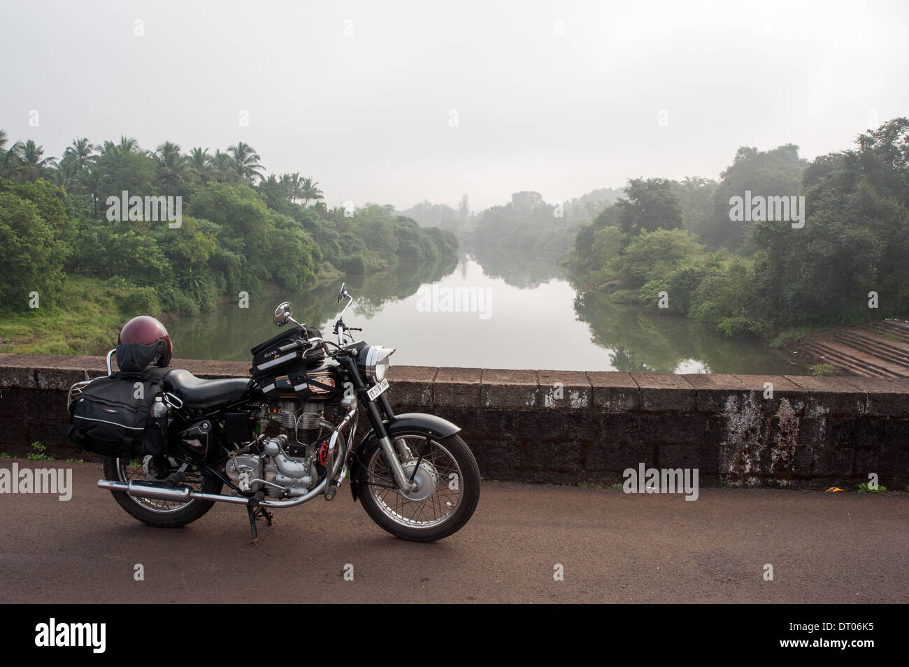 Royal Enfield on bridge on NH 17 Mumbai Goa road in morning fog Stock ...