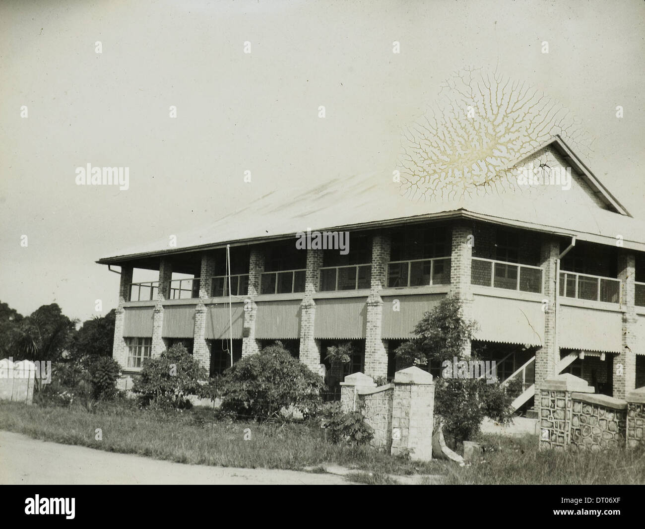 A brick mission building located in the Congo, photographed between ...