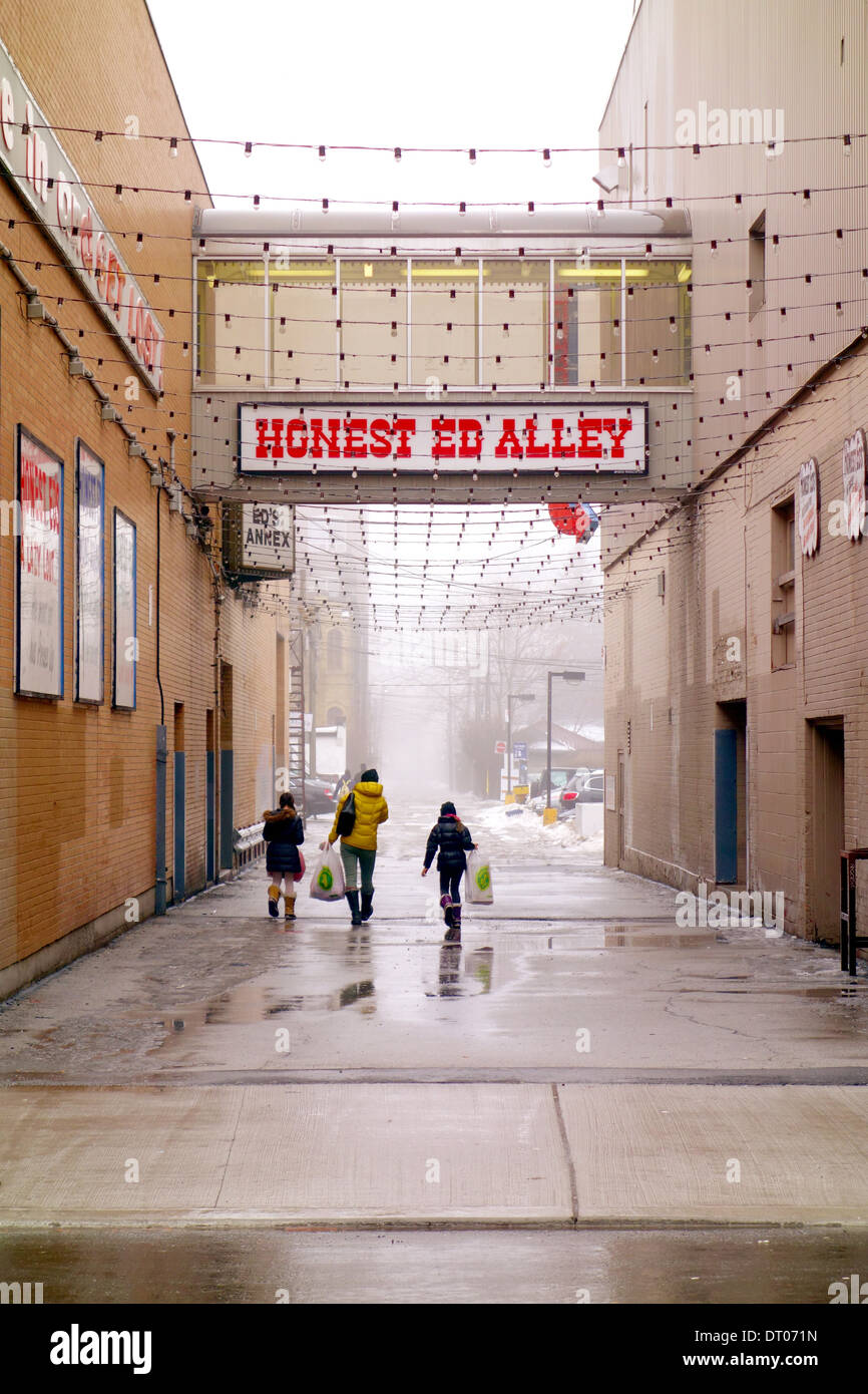 Three people walking a urban alley in Toronto, Canada Stock Photo - Alamy
