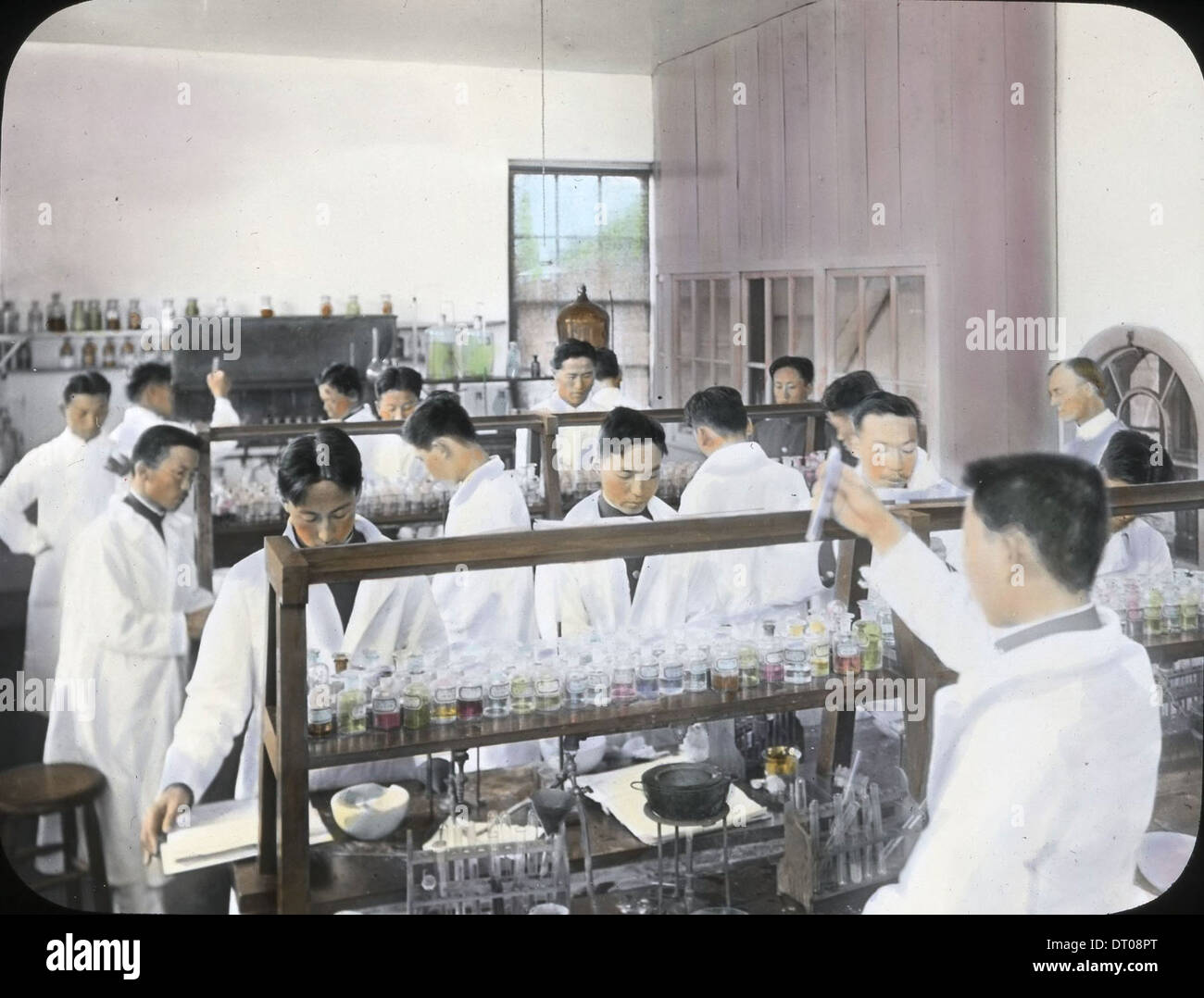 A photograph taken inside a chemical laboratory in Seoul, showing early ...
