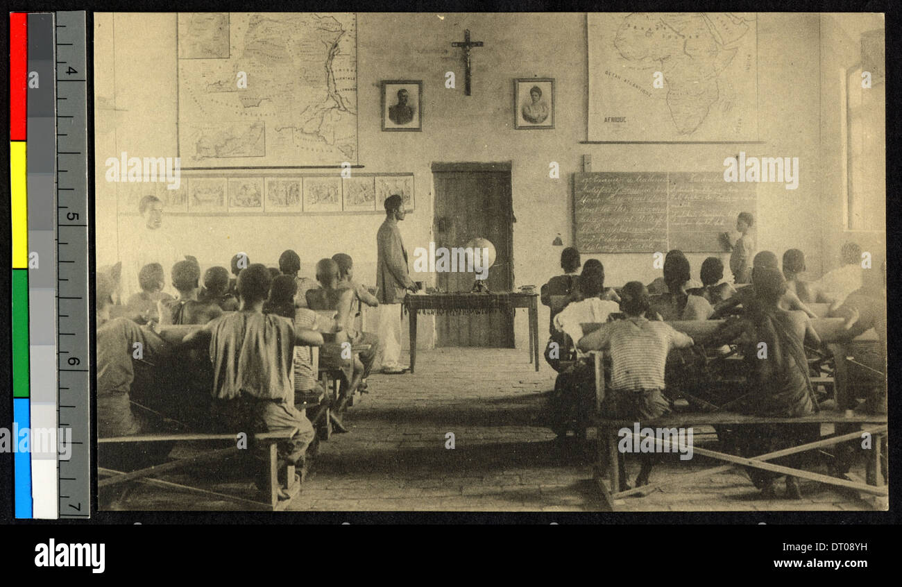 A photograph showing children sitting in a classroom in the Congo ...