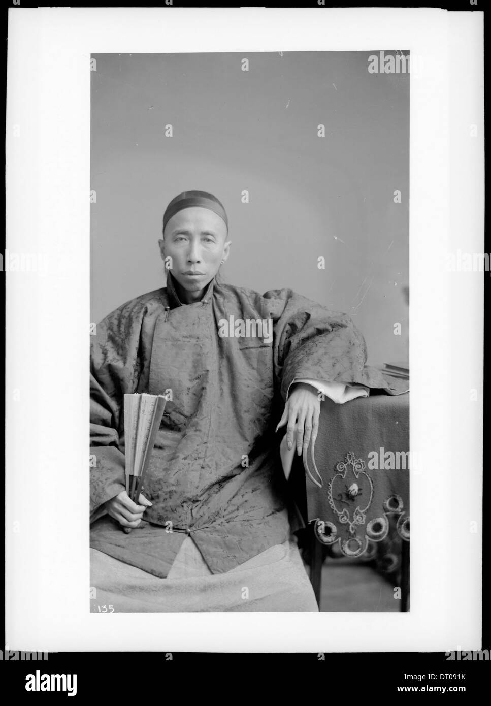 A Chinese doctor with long fingernails, photographed between 1895 and ...
