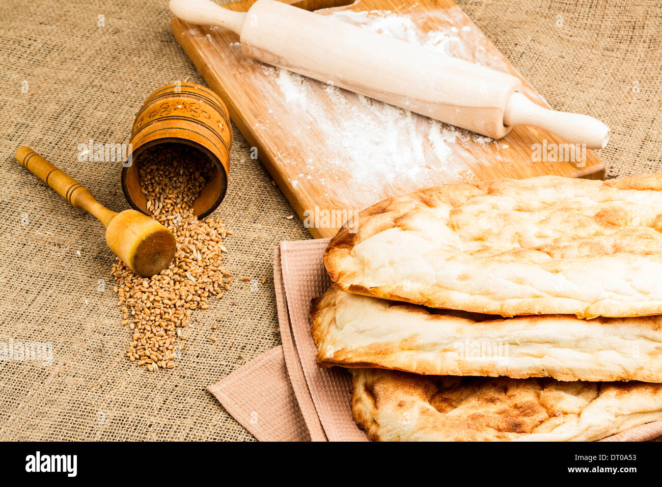 fresh pita bread isolated on sacking background Stock Photo - Alamy