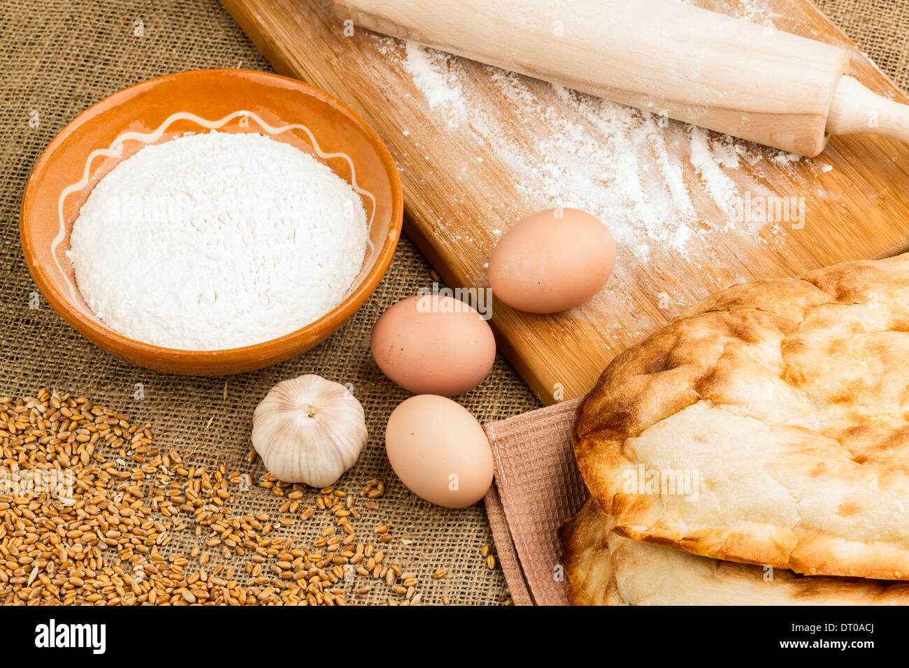 fresh pita bread isolated on sacking background Stock Photo - Alamy