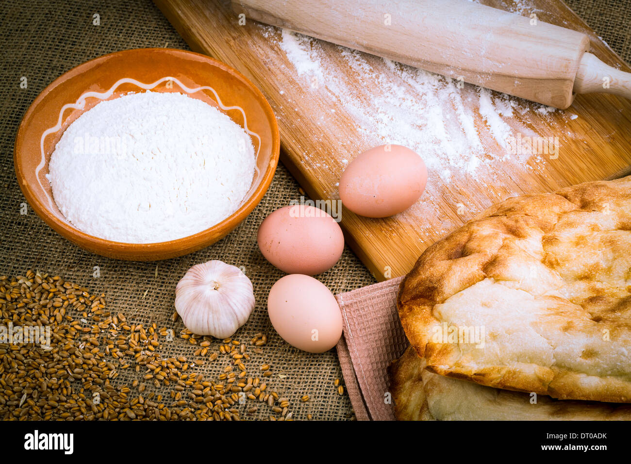 fresh pita bread isolated on sacking background Stock Photo - Alamy