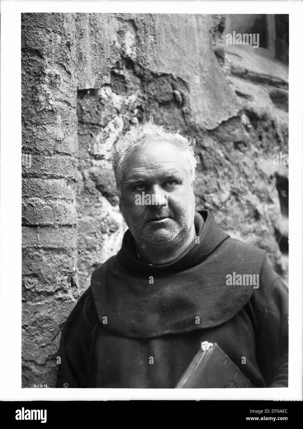 A close-up photograph of Father Superior O'Keefe standing in the ruins ...