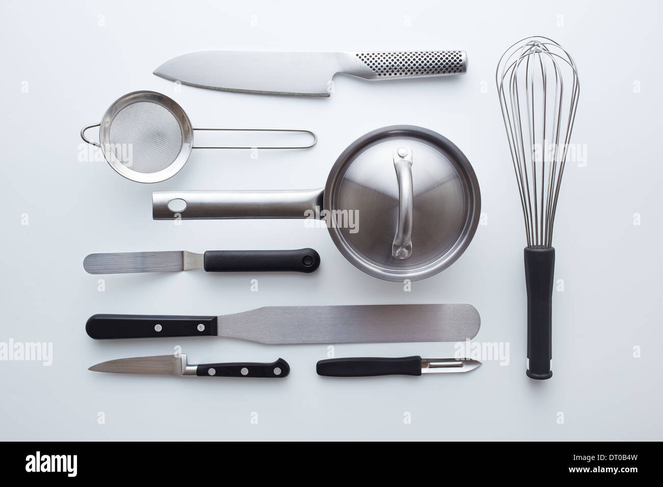 Professional kitchen utensils on white background overlook shot Stock ...