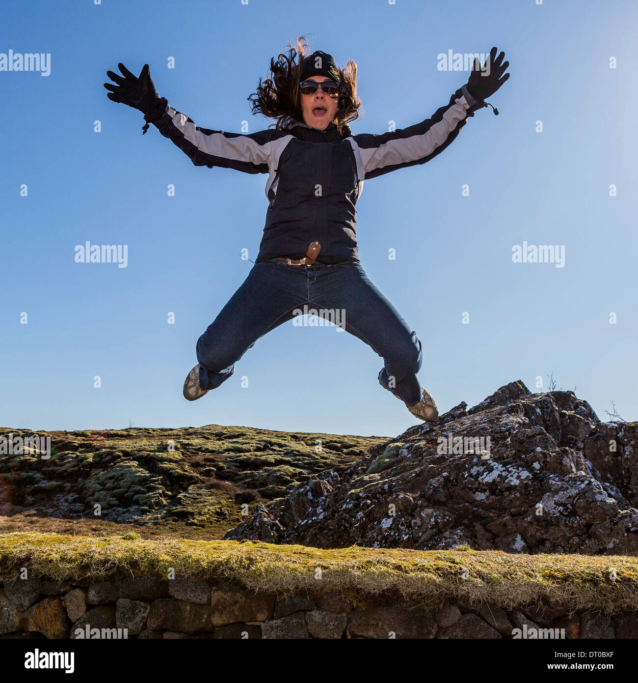 Teenager jumping, Thingvellir National Park, Iceland Stock Photo - Alamy