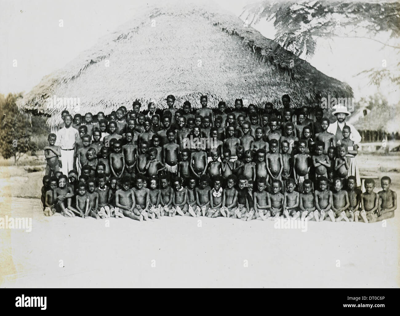 Missionaries and village boys are seen in the Congo during the early ...