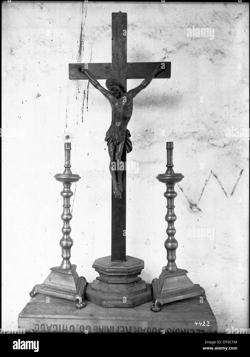 Crucifix and altar candlesticks at Mission San Juan Capistrano ...