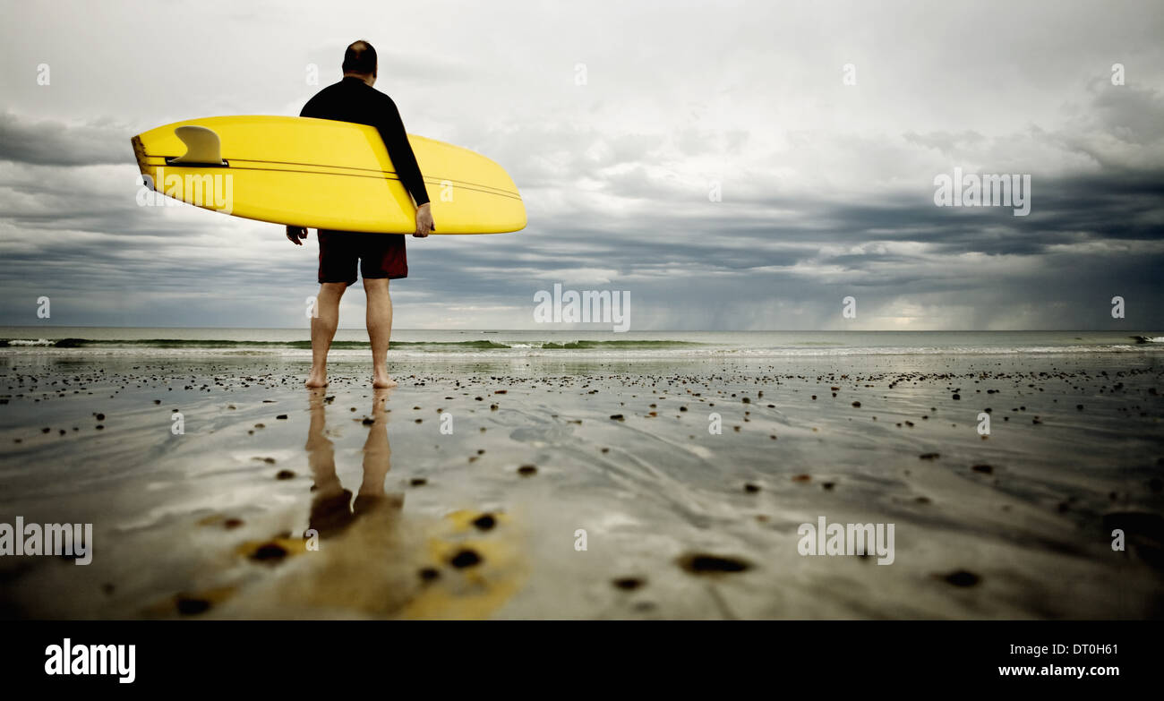 Massachusetts USA middle aged man surfer New England Rockport Beach ...
