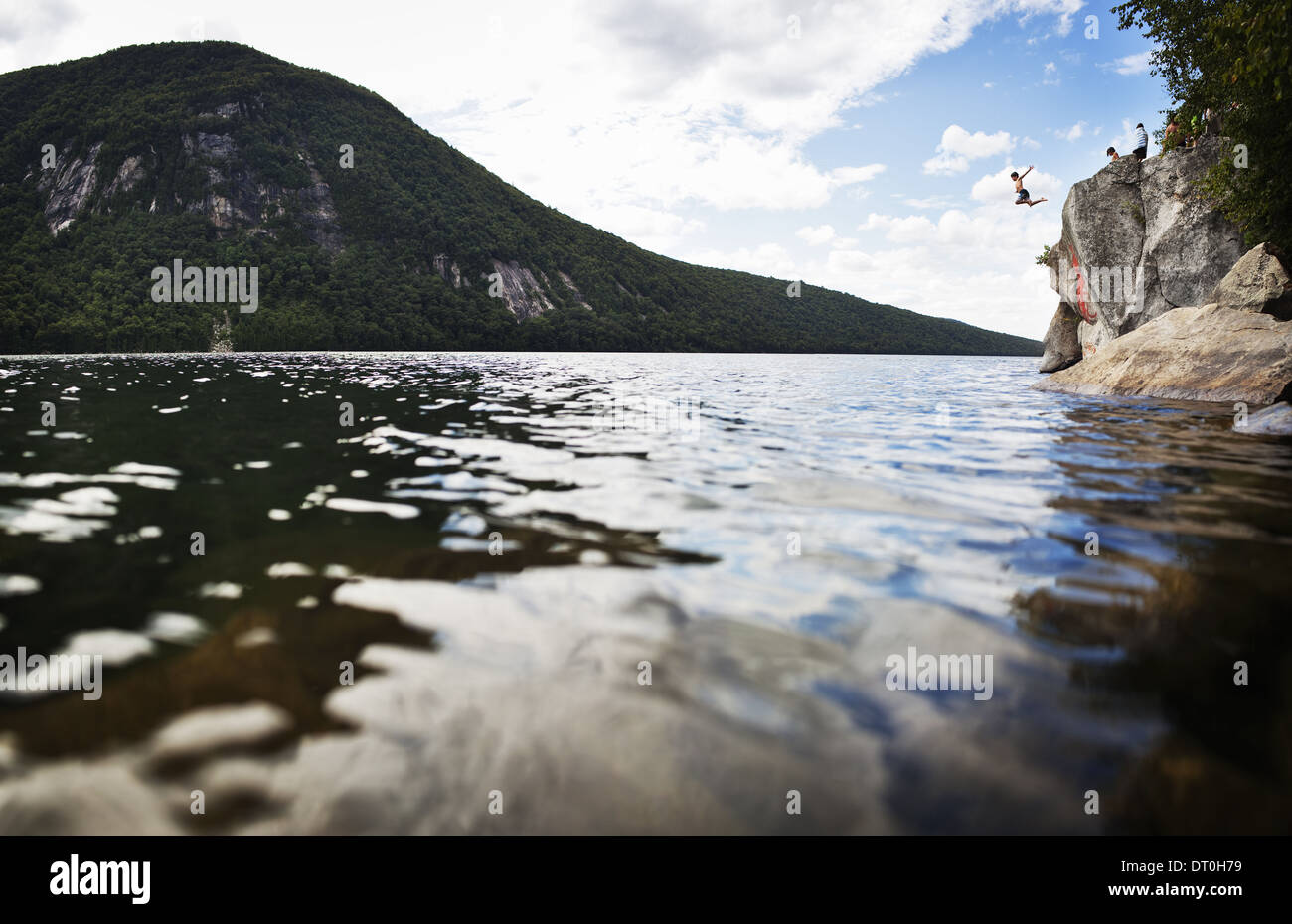 Jumping from cliff hi-res stock photography and images - Alamy
