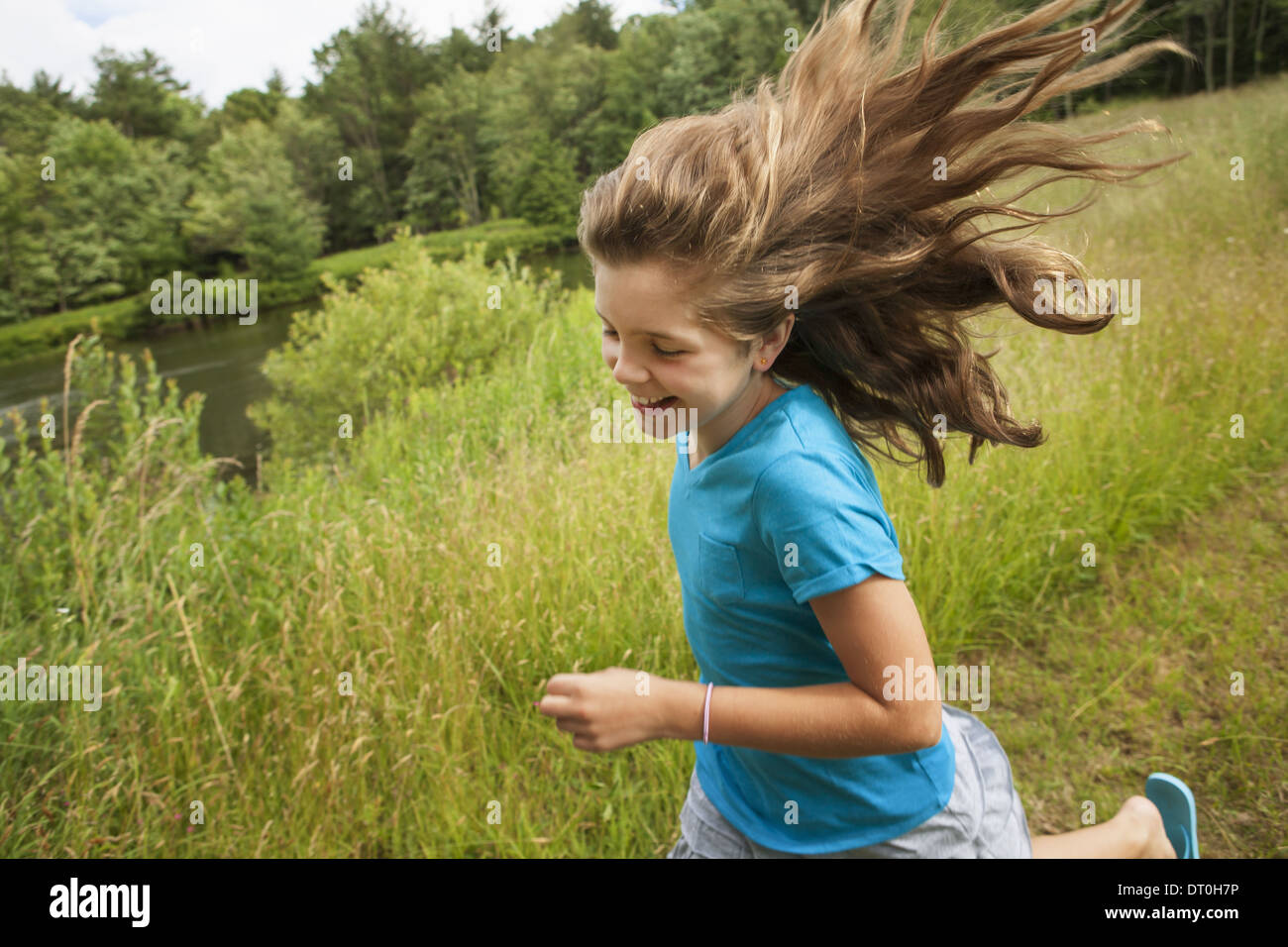 New York state USA young girl running hair flying out behind her Stock ...