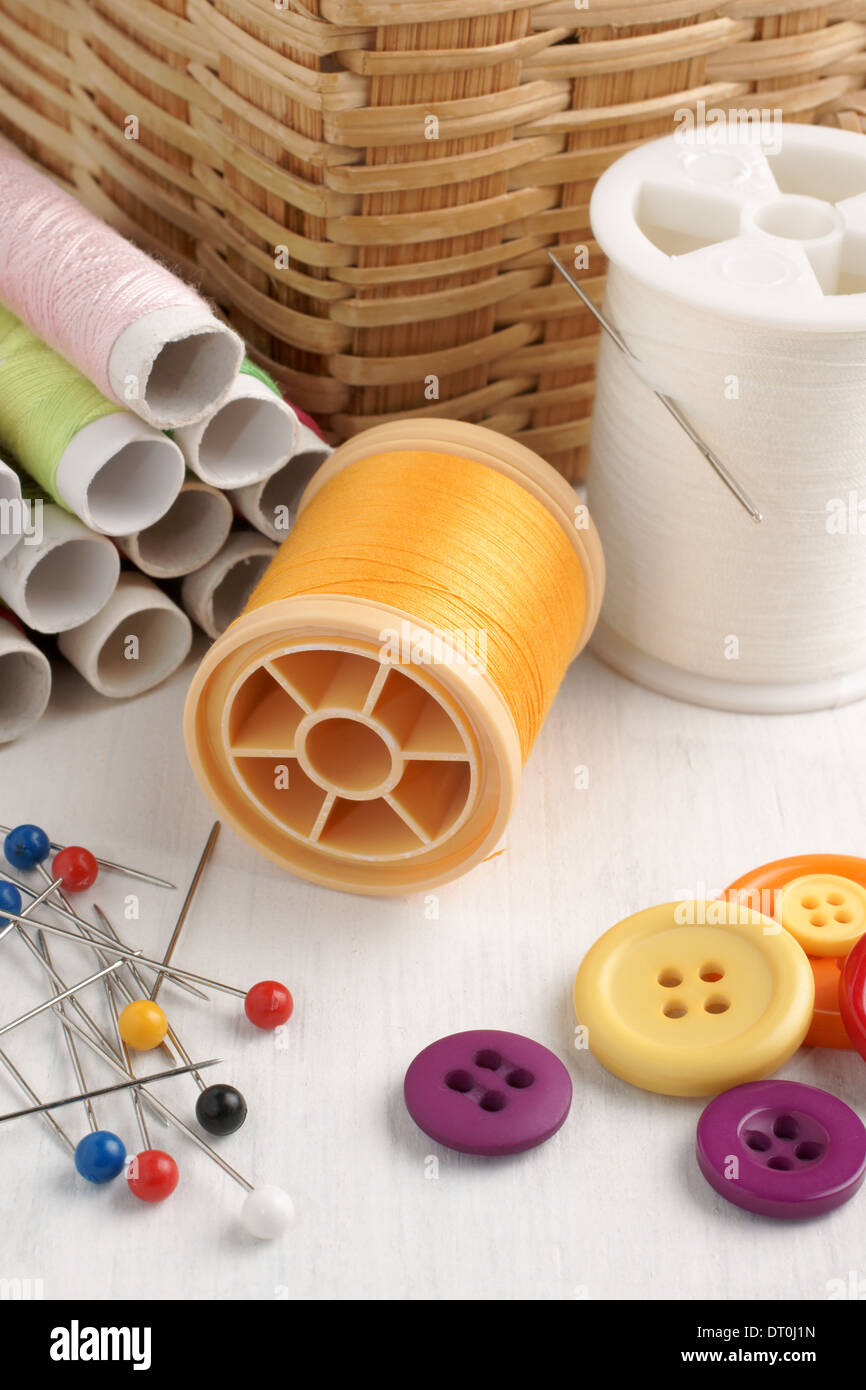 Sewing thread pins and buttons Stock Photo - Alamy