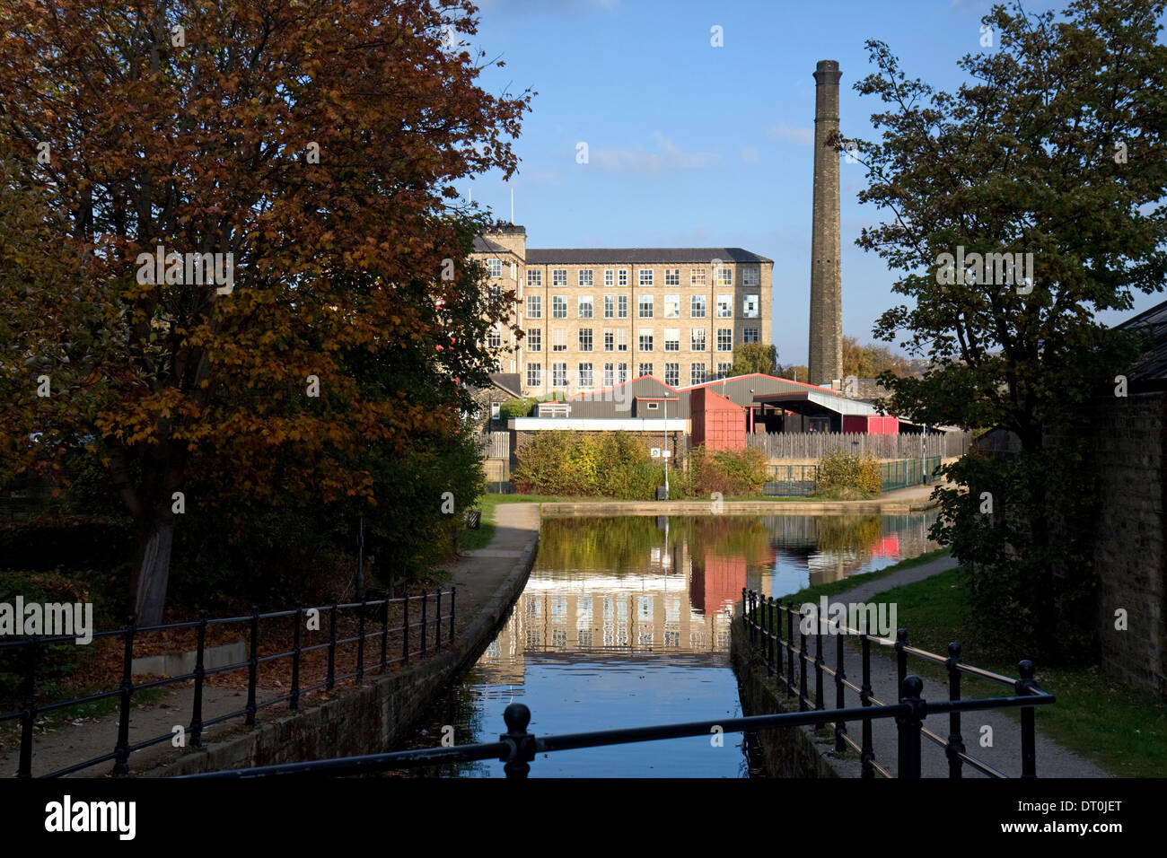 Spa Mill reflected in the Huddersfield Narrow Canal at Slaithwaite ...