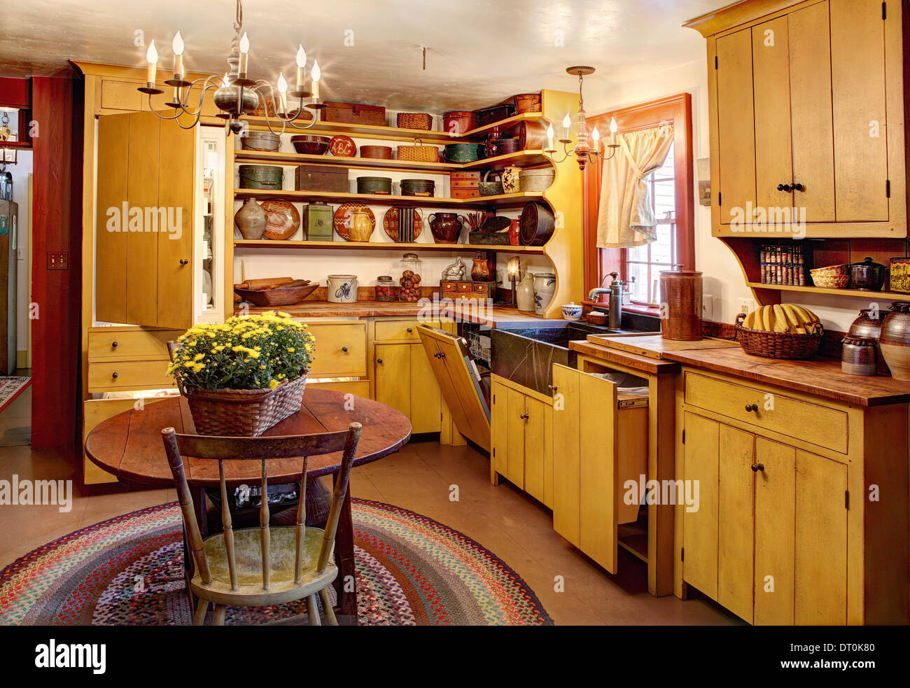 An interior vies of the kitchen in an authentic primitive colonial ...