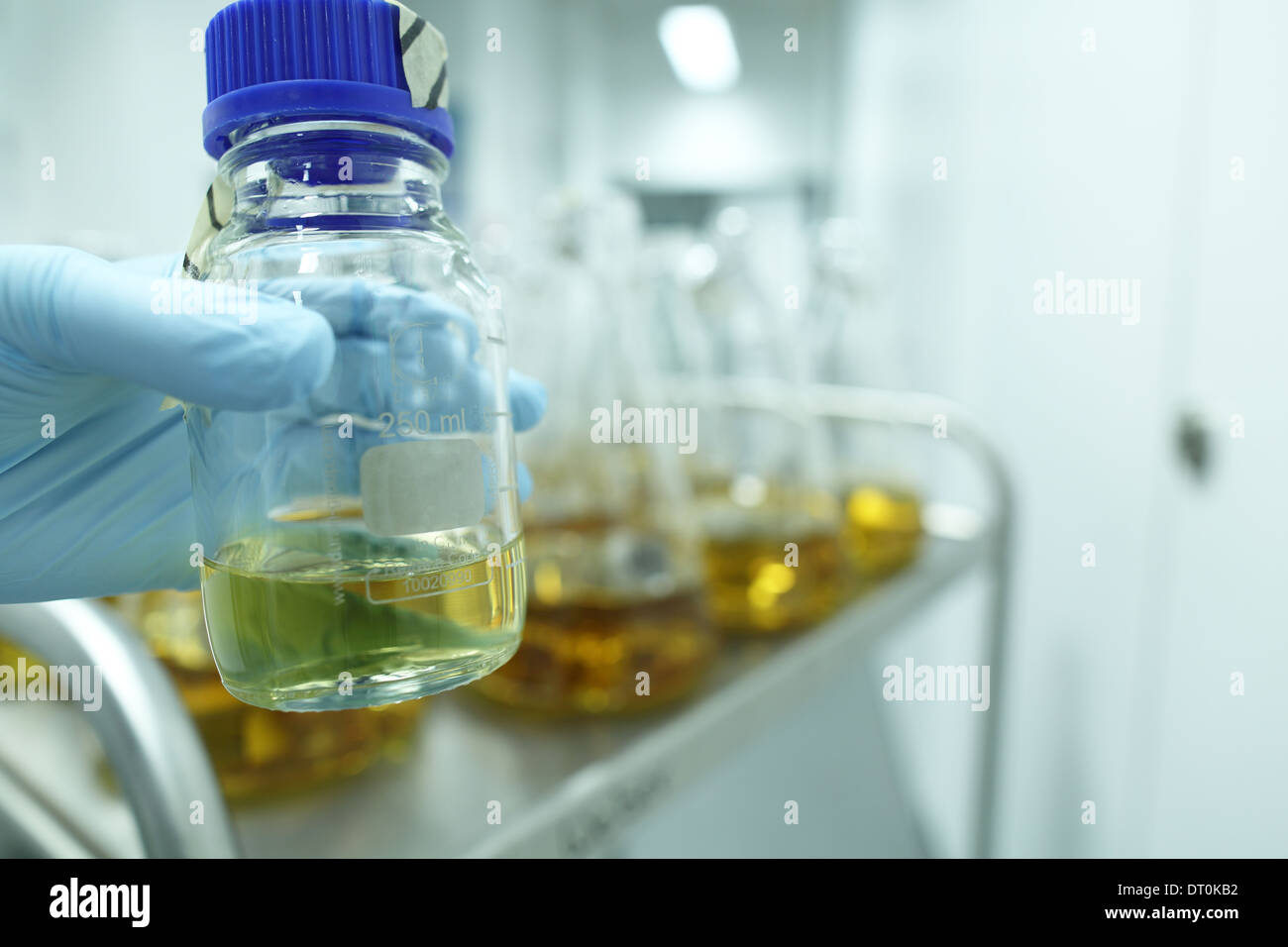 biological sterile medium bottles in a research lab Stock Photo - Alamy