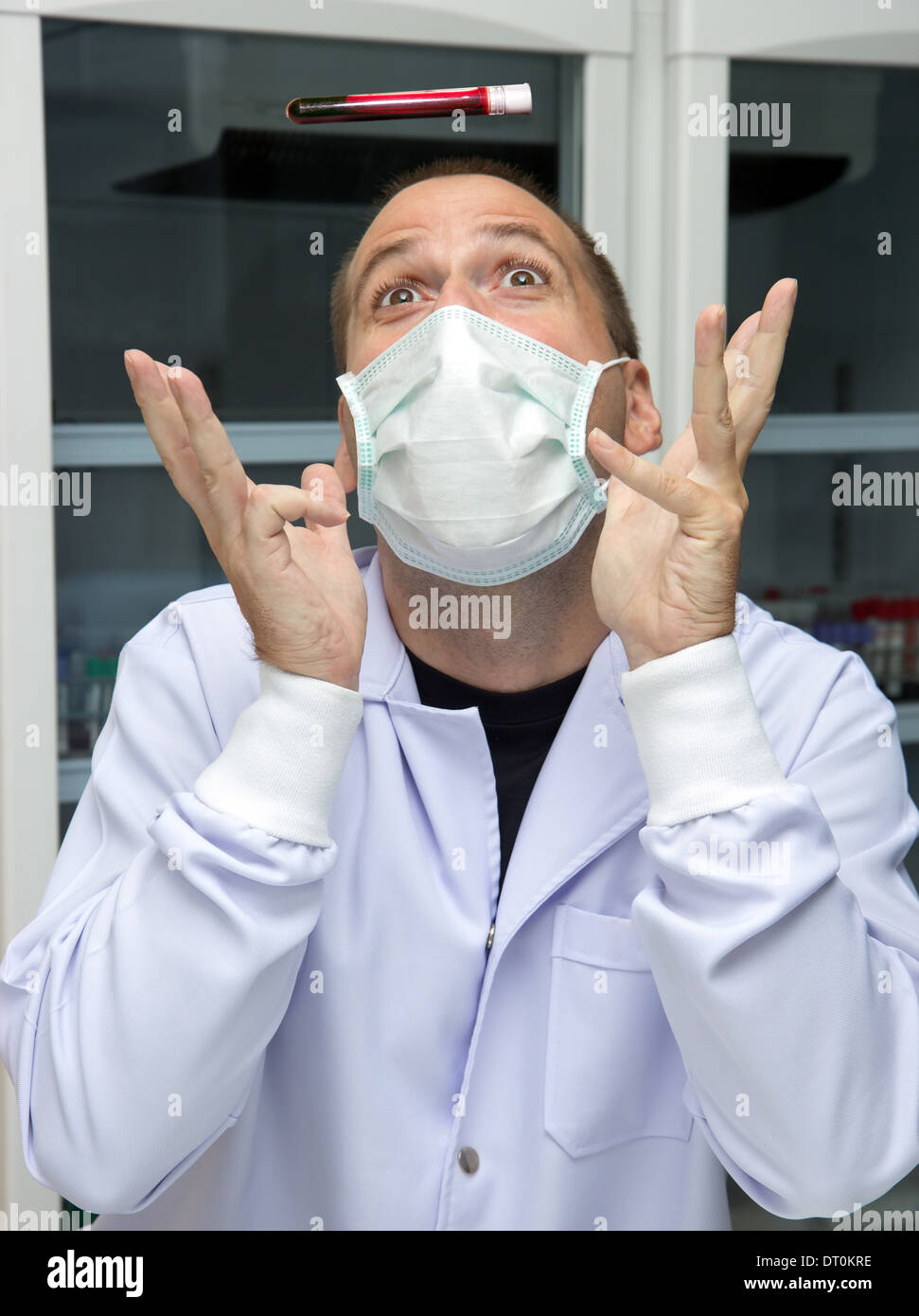man in lab throw blood tube Stock Photo - Alamy
