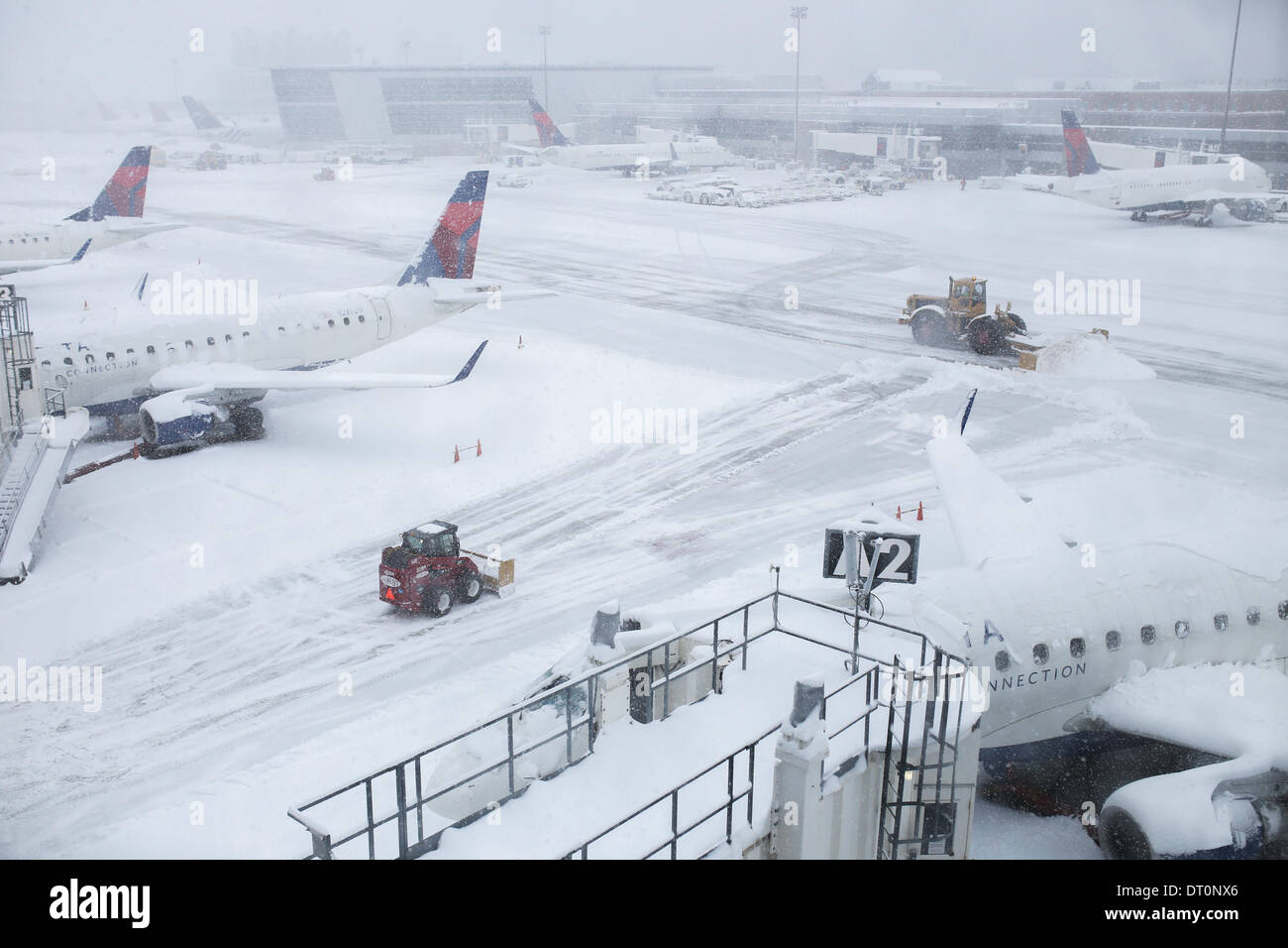 Boston, Massachusetts, USA. 5th Feb, 2014. Planes stand idle at Boston ...