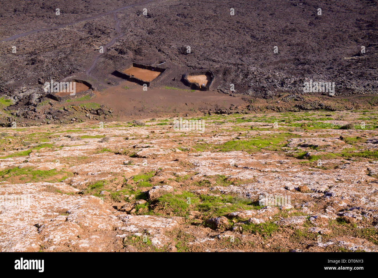 Empty animal farm underneath volcano in Volcanic park Timanfaya on ...