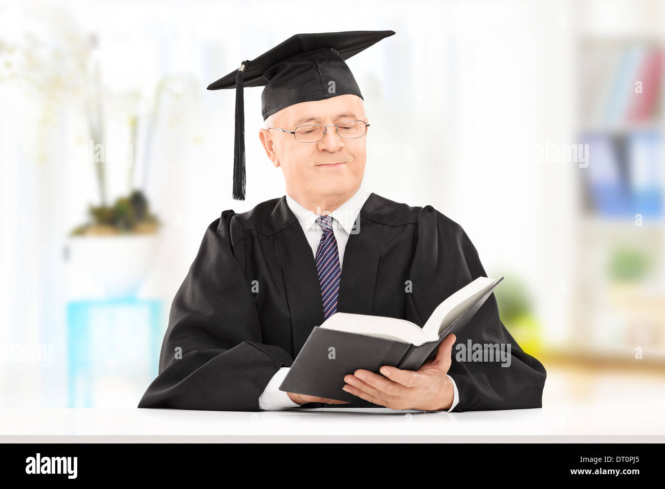 College dean in graduation gown hi-res stock photography and images - Alamy