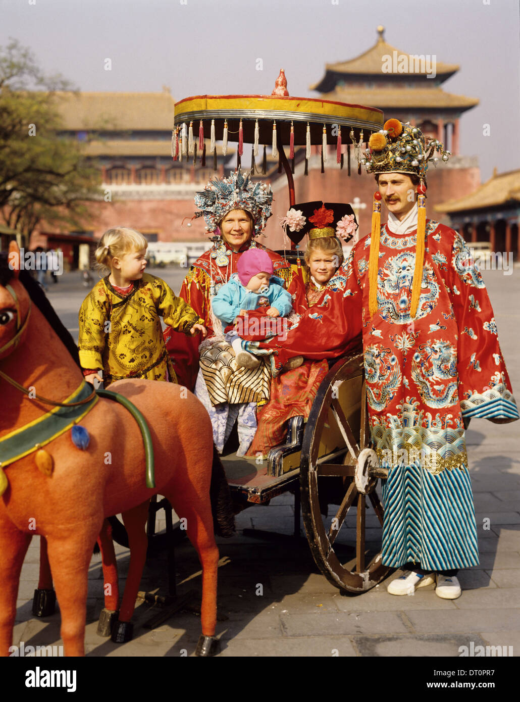 Foreigner family wearing Chinese costume Stock Photo - Alamy