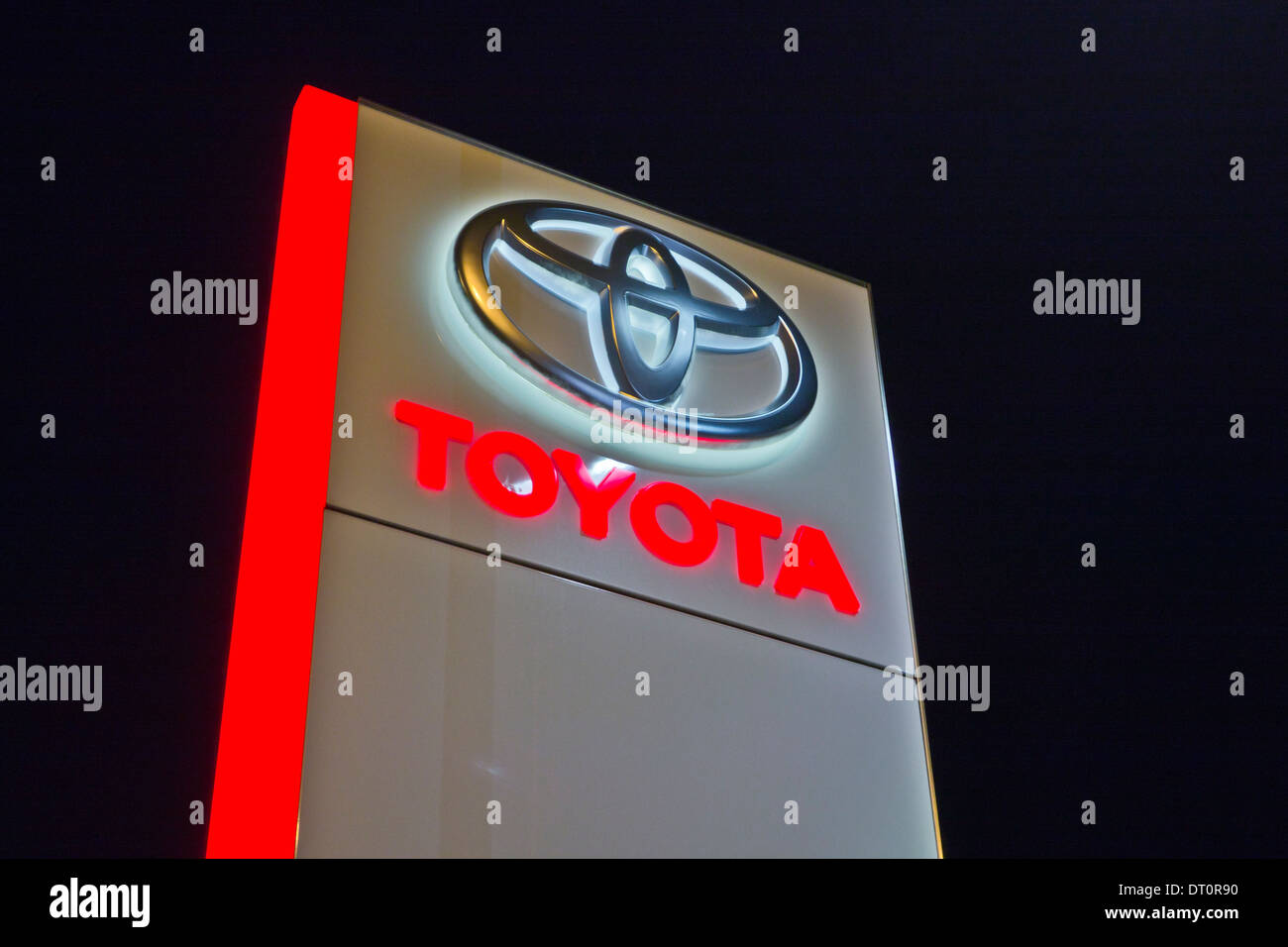 Illuminated Toyota Sign at Night Stock Photo - Alamy