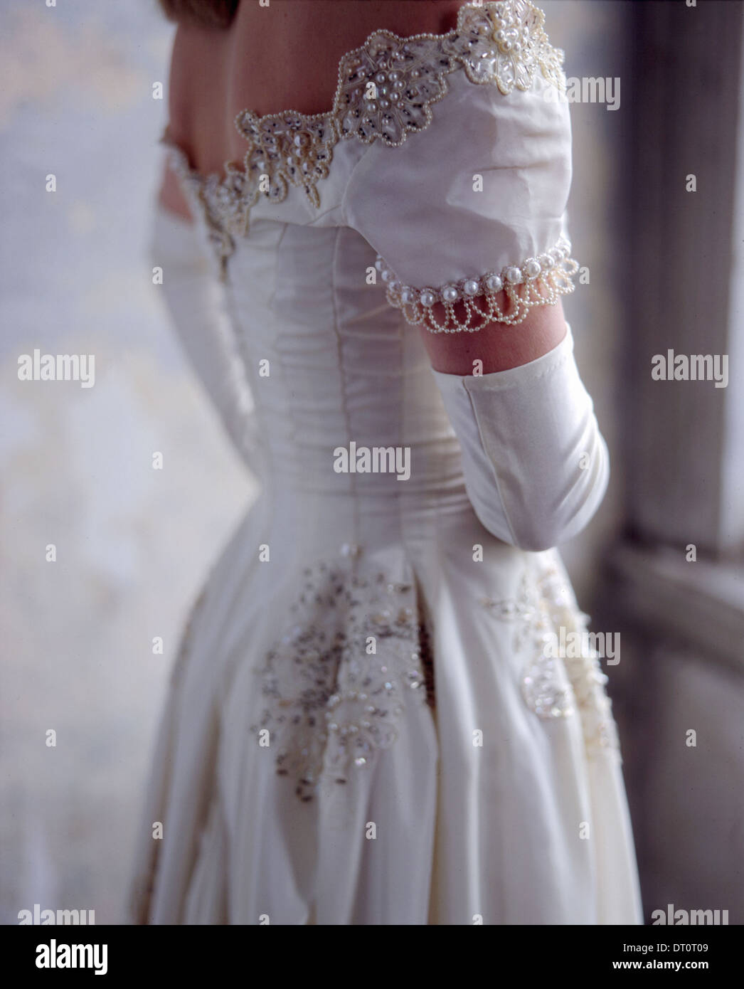 Close up of woman in ornate wedding dress Stock Photo - Alamy