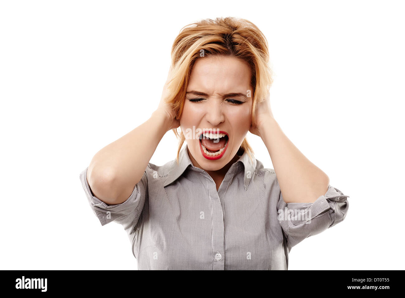 Angry businesswoman screaming and holding her head, isolated on white ...