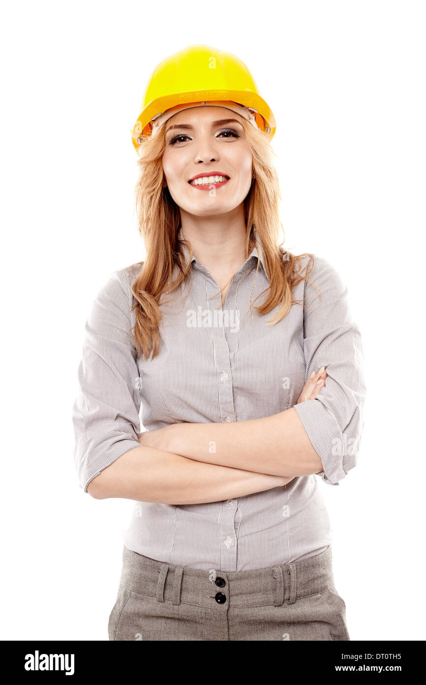 Young successful cheerful woman engineer wearing protection helmet with ...